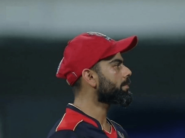 IPL 2021 : Virat Kohli Injured while fielding in IPL opener against MI